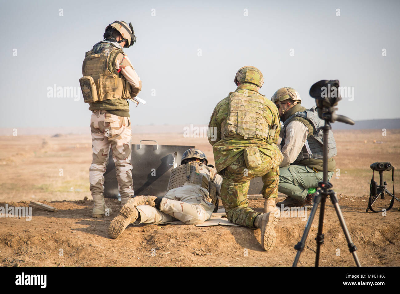 Iraqi security forces prepare to fire a Steyr HS-50 sniper rifle under ...