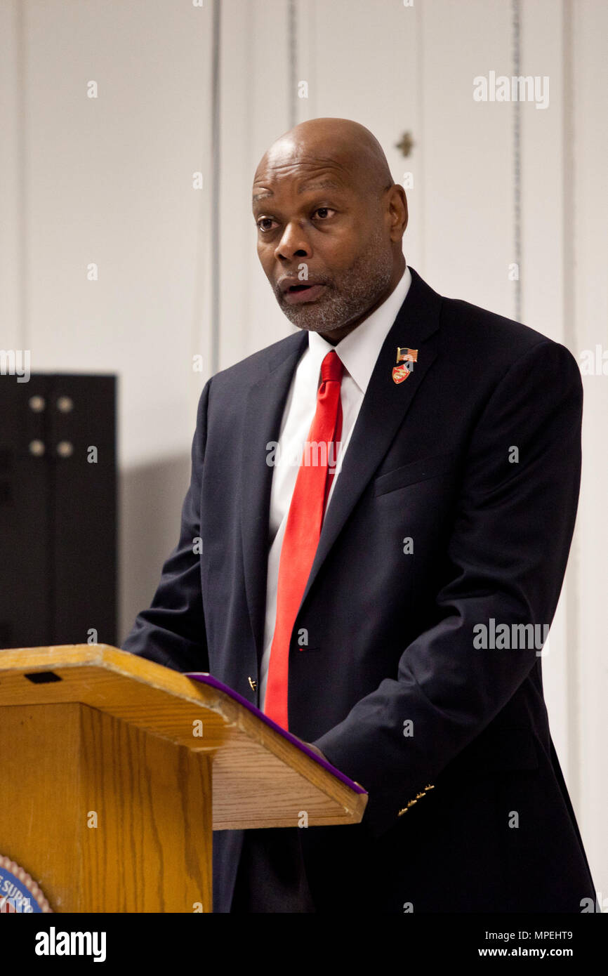 Retired U.S. Marine Corps Col. Grover C. Lewis addresses guests during ...