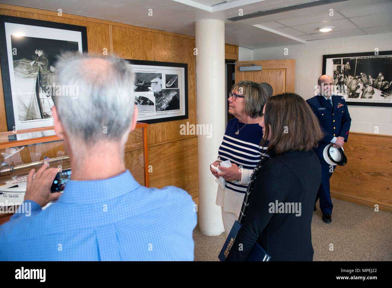 Patricia Webber-Hamilton, daughter of Bernard C. Webber, looks at a ...