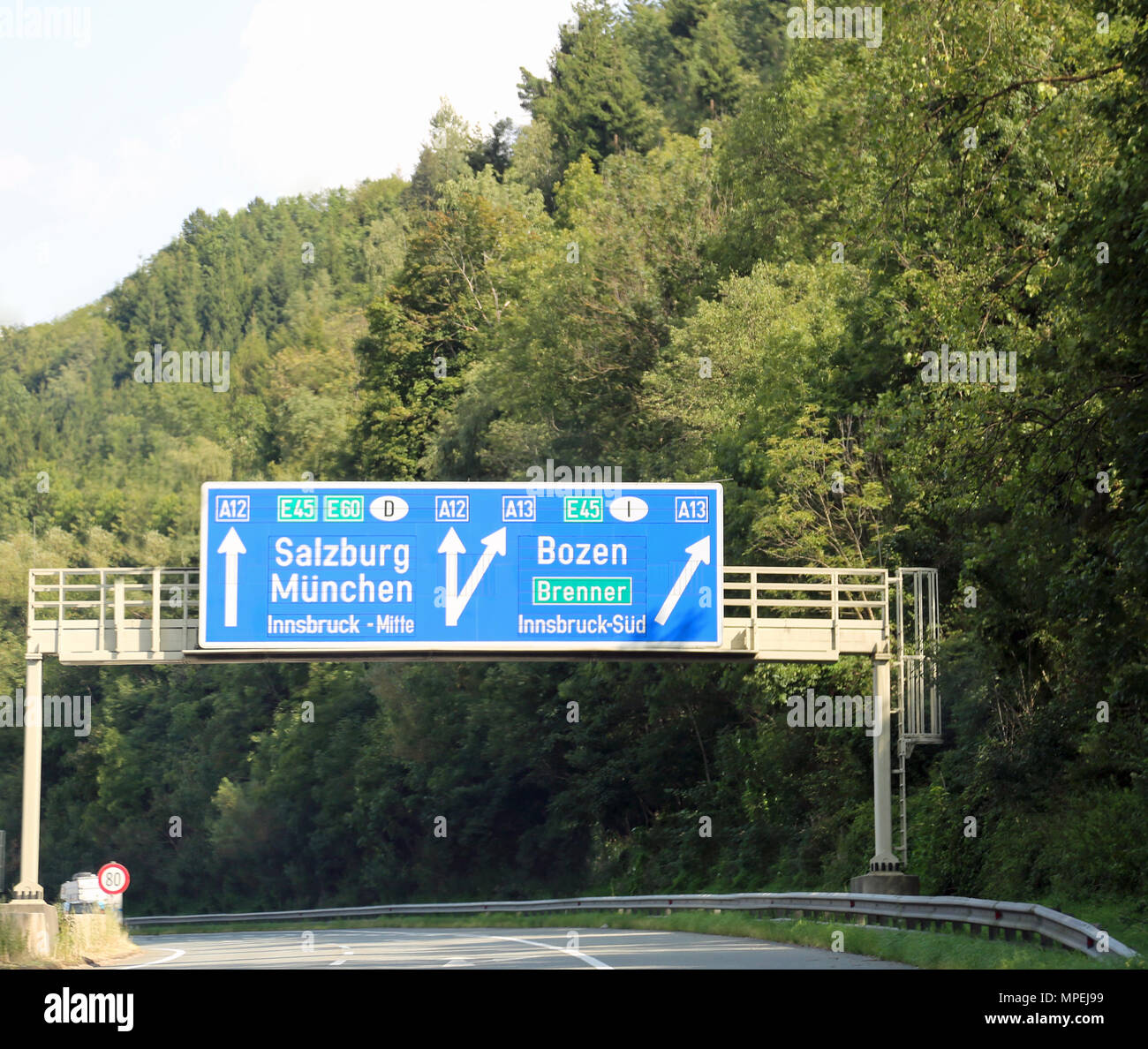Road signs with directions to cities and state borders on the Austrian ...