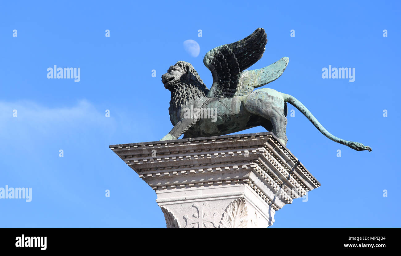 copper winged lion symbol of Venice above a column in Piazza San Marco ...