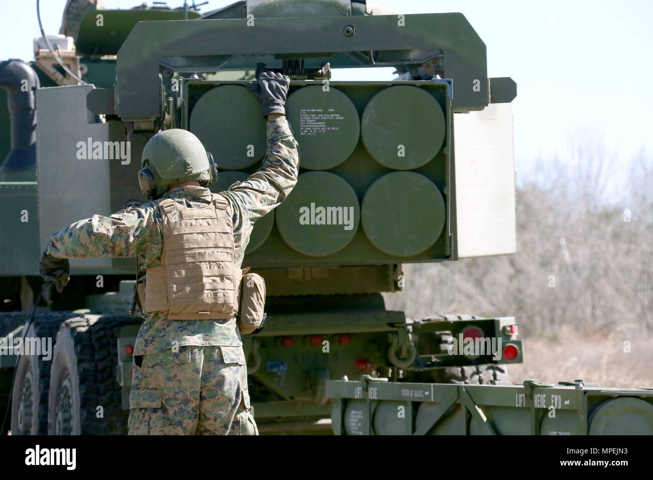 A U.S. Marine with Fox Battery, 2nd Battalion, 14th Marine Regiment ...