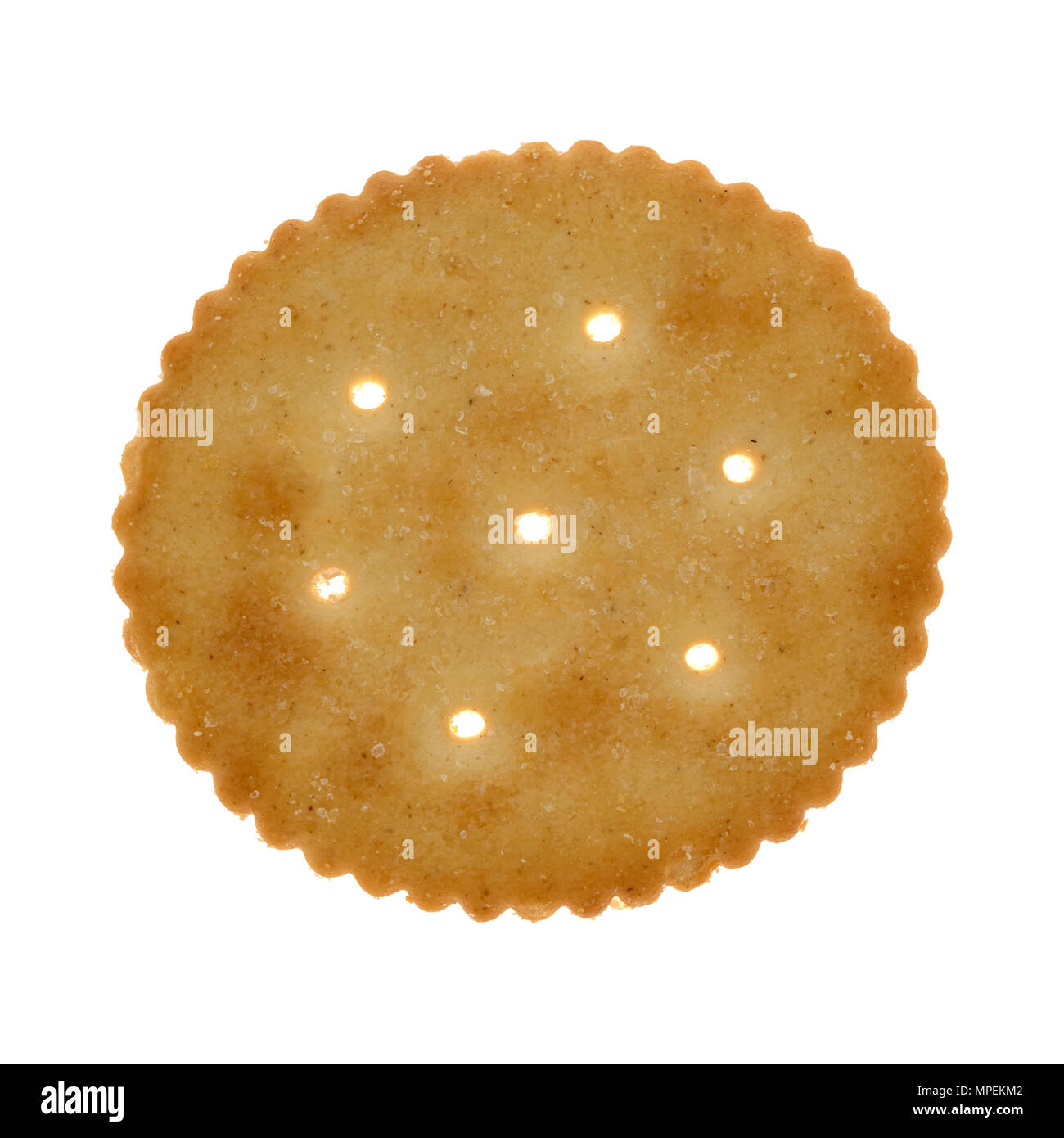 Top view of a single yellow snack cracker with holes isolated on a ...