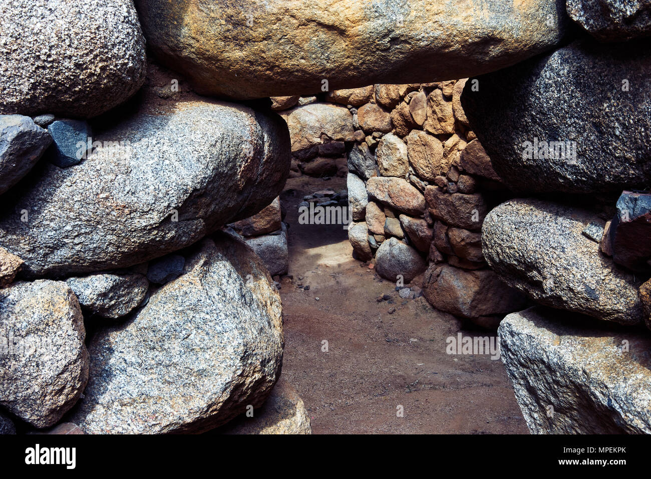 Main entrance of a Nuraghe, a typical ancient rock building of the ...