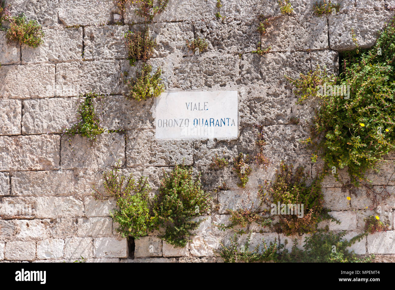 Street name set into the city wall of the medieval town of Ostuni ...