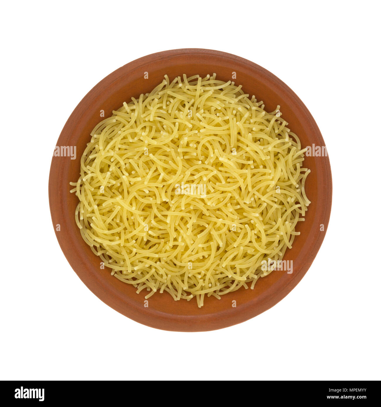 Top view of a small bowl filled with vermicelli pasta isolated on a ...
