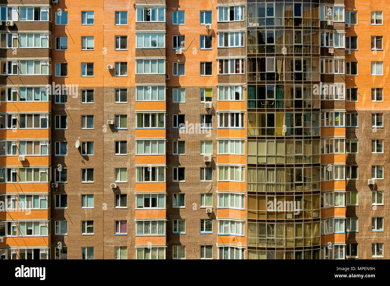 Windows and balconies of an apartment building Stock Photo - Alamy