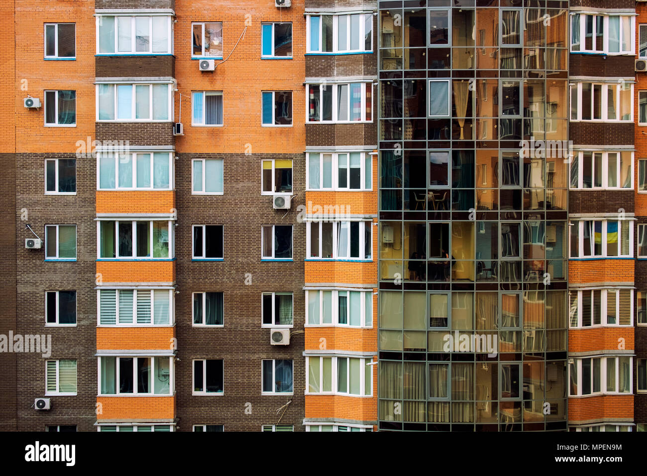 Windows and balconies of an apartment building Stock Photo - Alamy