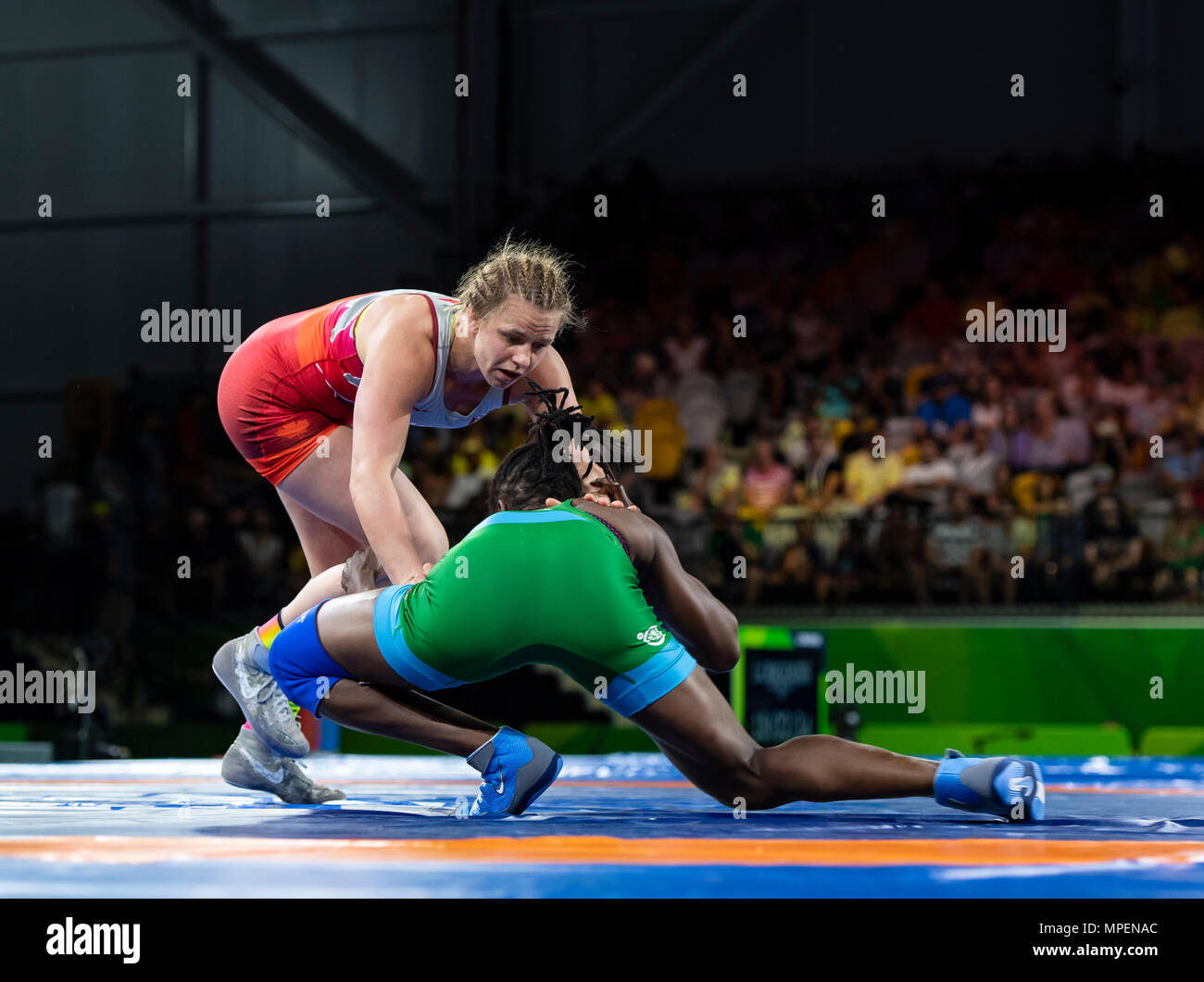 GOLD COAST, AUSTRALIA - APRIL 12: Erica Wiebe of Canada v Blessing Onyebuchi of Nigeria ...