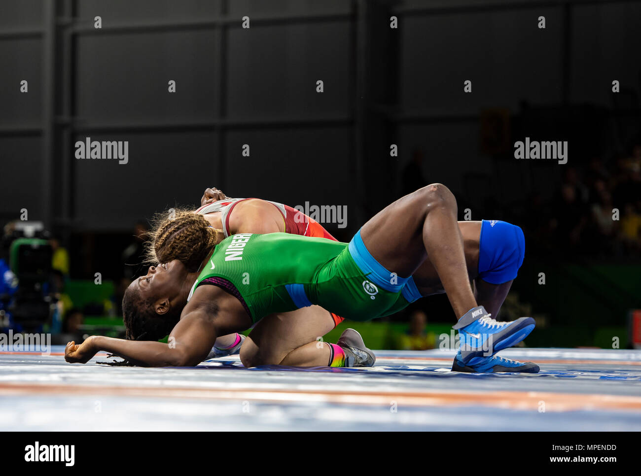 GOLD COAST, AUSTRALIA - APRIL 12: Erica Wiebe of Canada v Blessing Onyebuchi of Nigeria ...