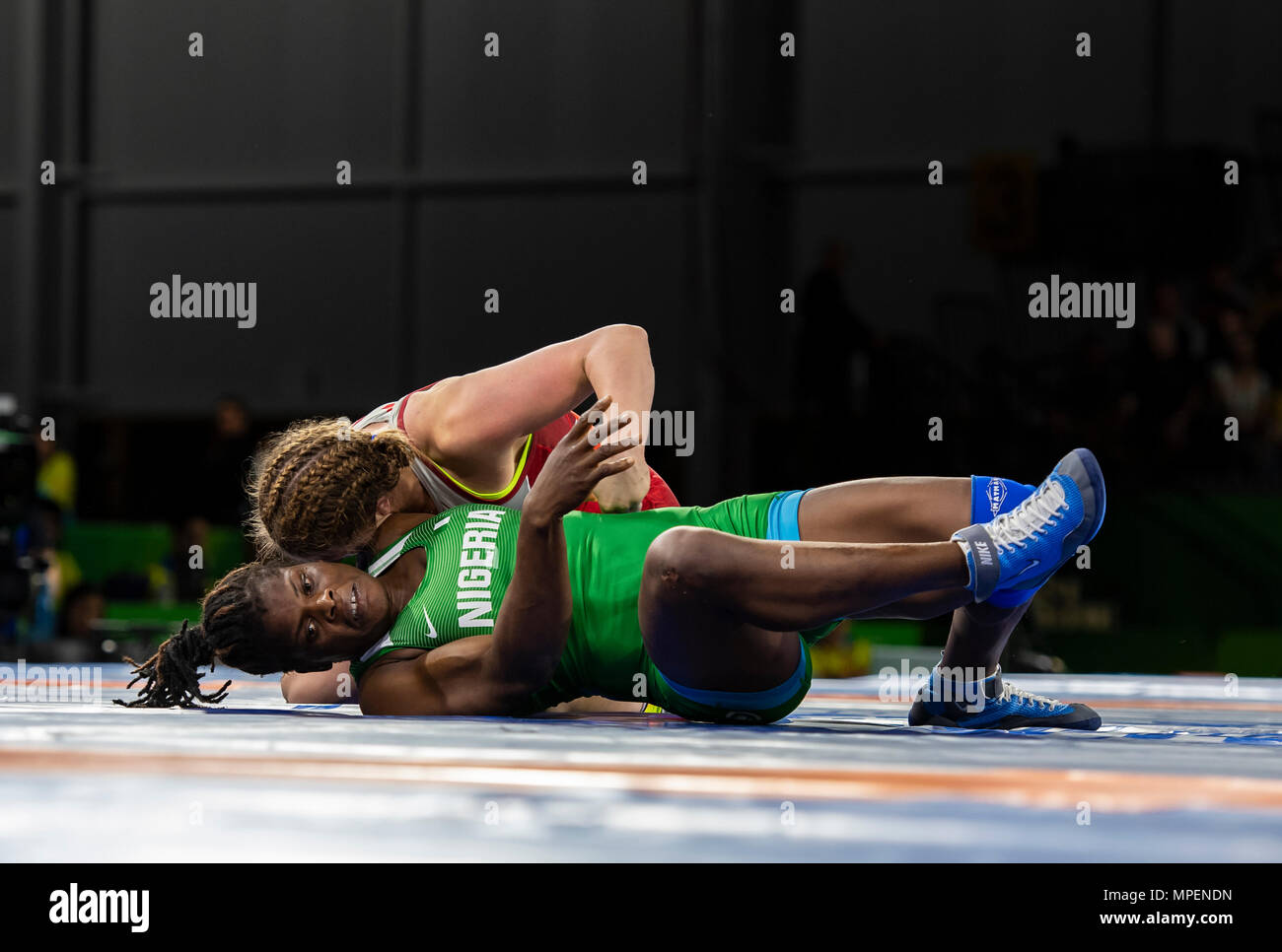 GOLD COAST, AUSTRALIA - APRIL 12: Erica Wiebe of Canada v Blessing Onyebuchi of Nigeria ...