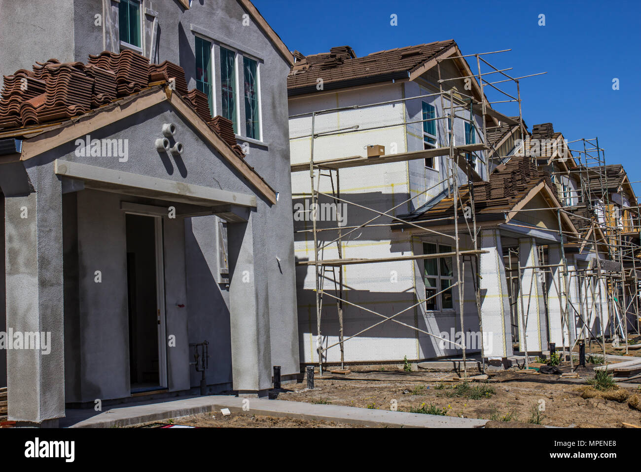 Row Of New Homes Under Construction Stock Photo - Alamy