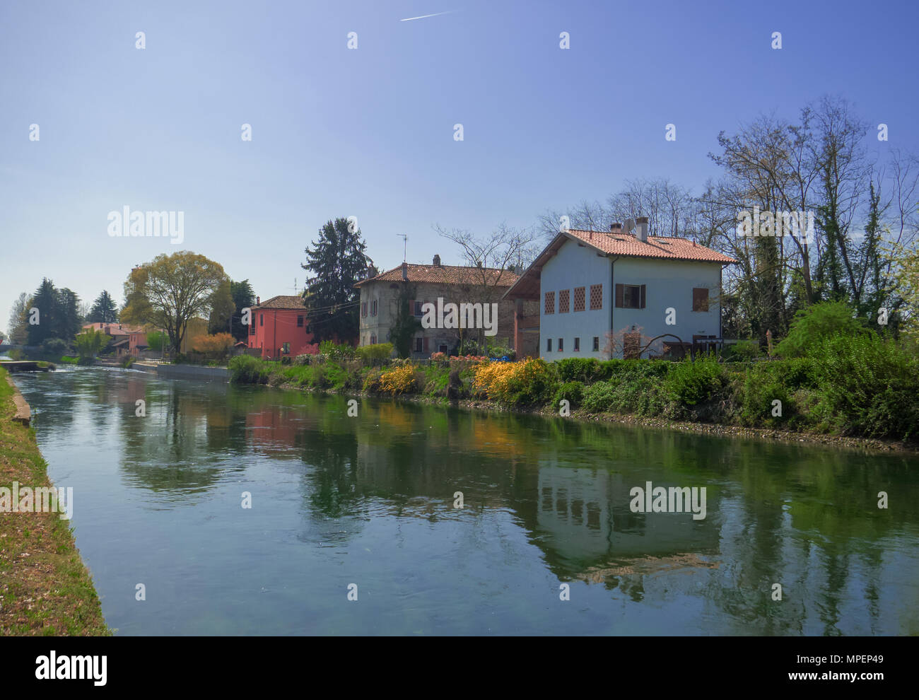 the Naviglio Grande, a navigational canal that crosses the countryside ...