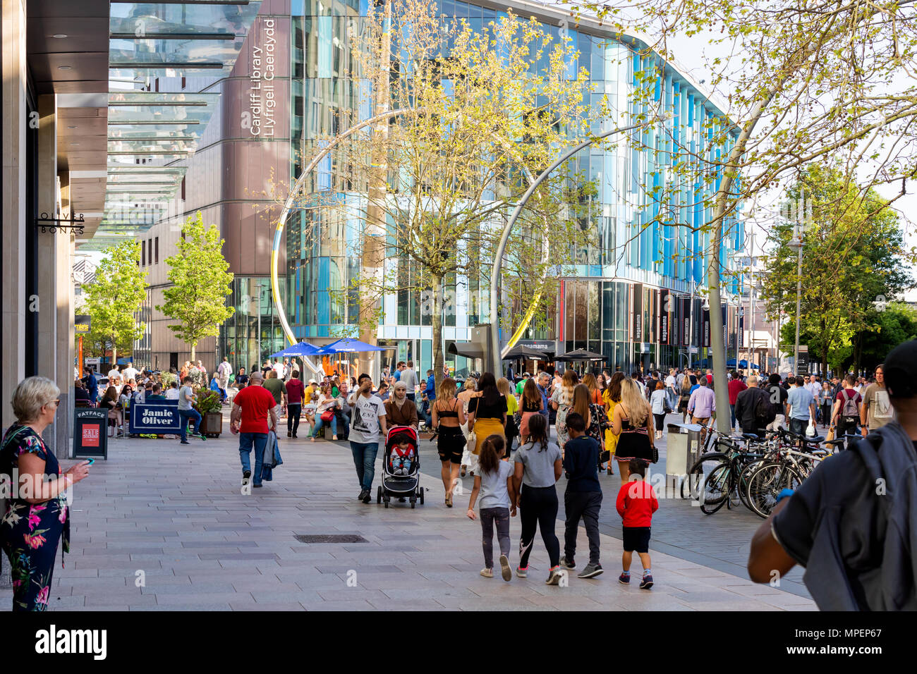 A busy street with lots of people in The city of Cardiff Stock Photo ...