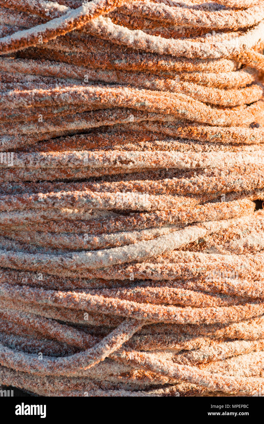 Big coiled pile of rope hi-res stock photography and images - Alamy