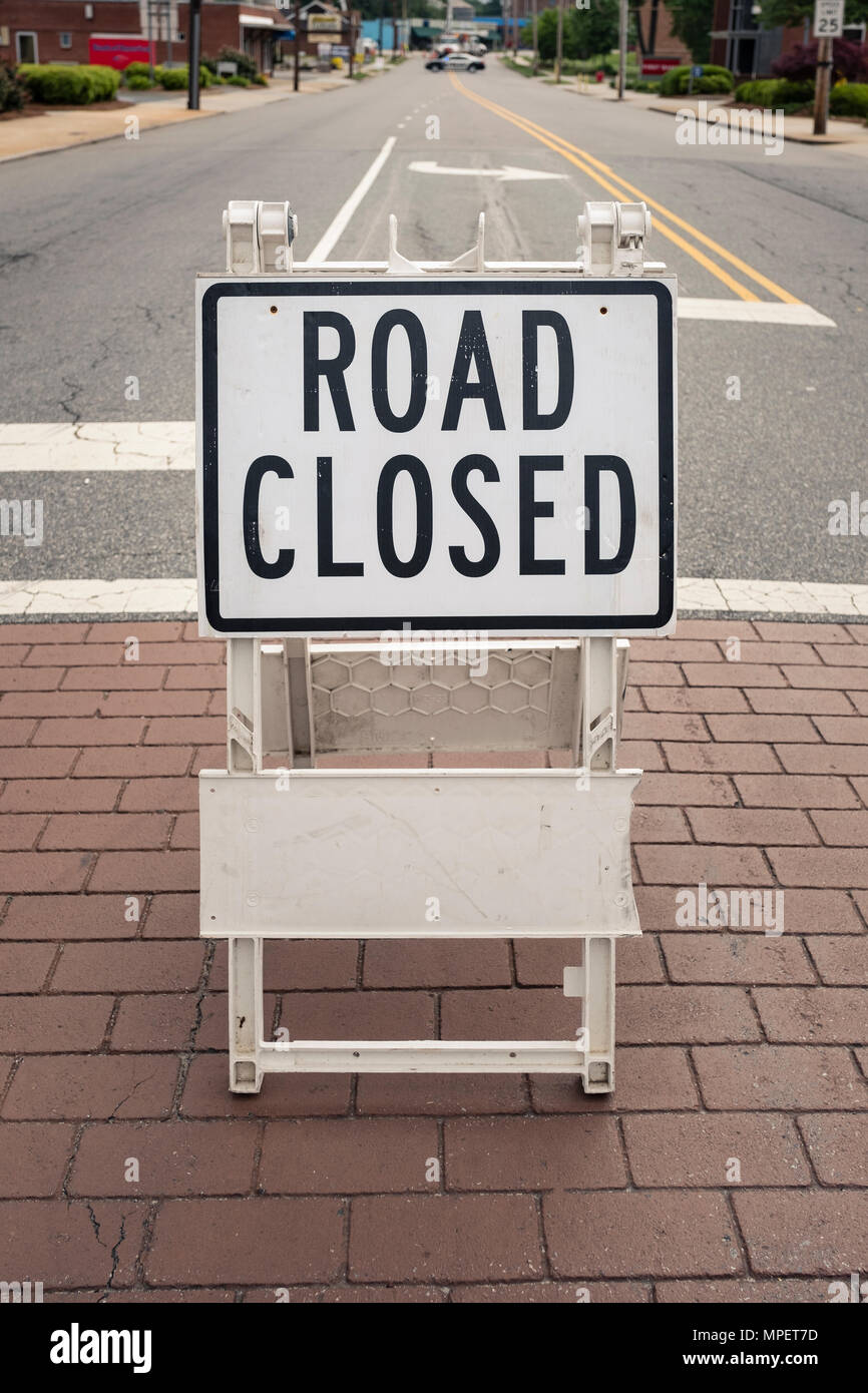 Road closed sign on a city road impassable for repairs Stock Photo - Alamy