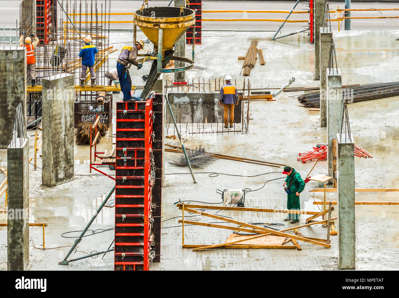 Workers are working on the construction site. Concrete construction ...