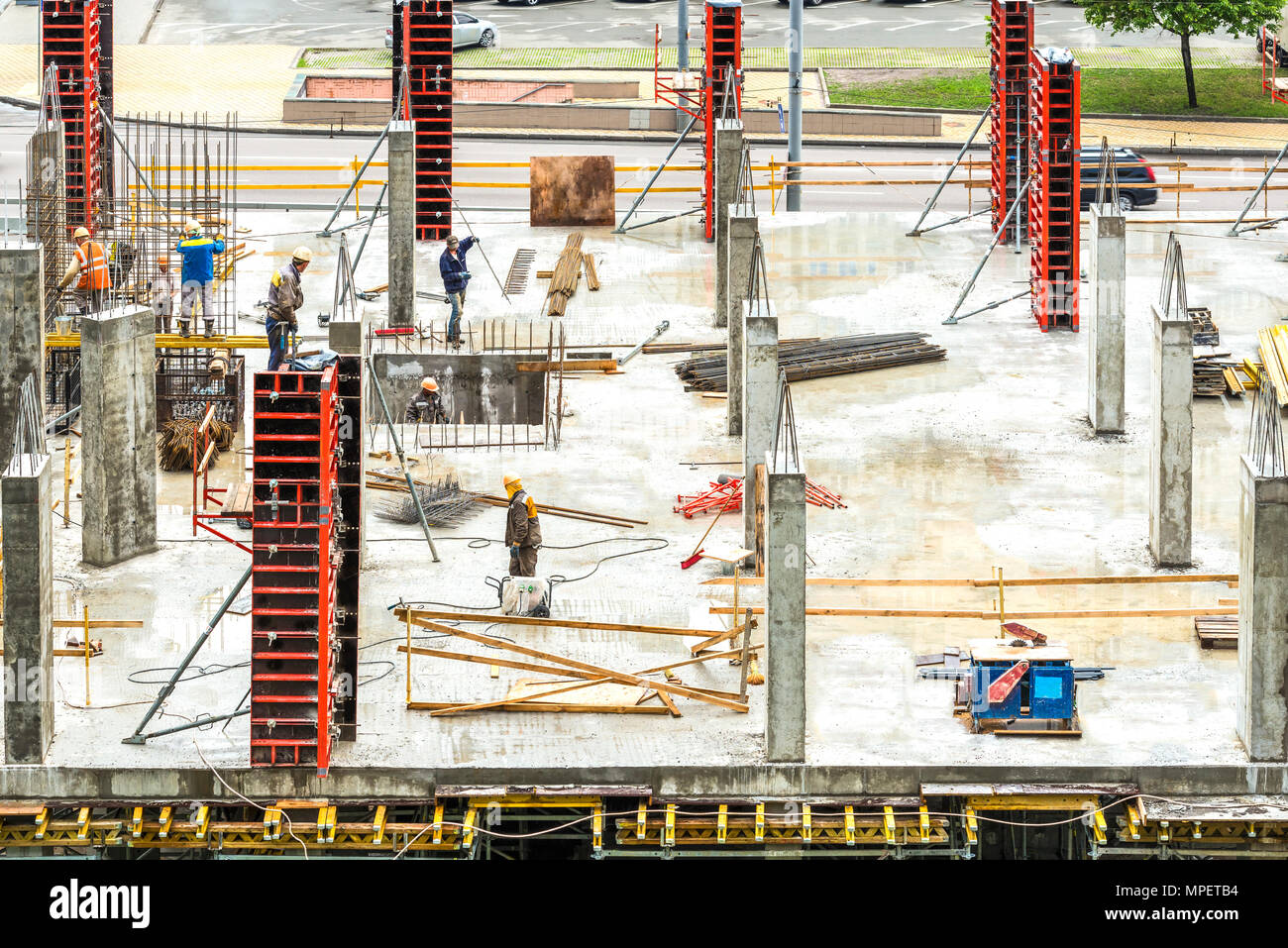 Workers are working on the construction site. Concrete construction ...