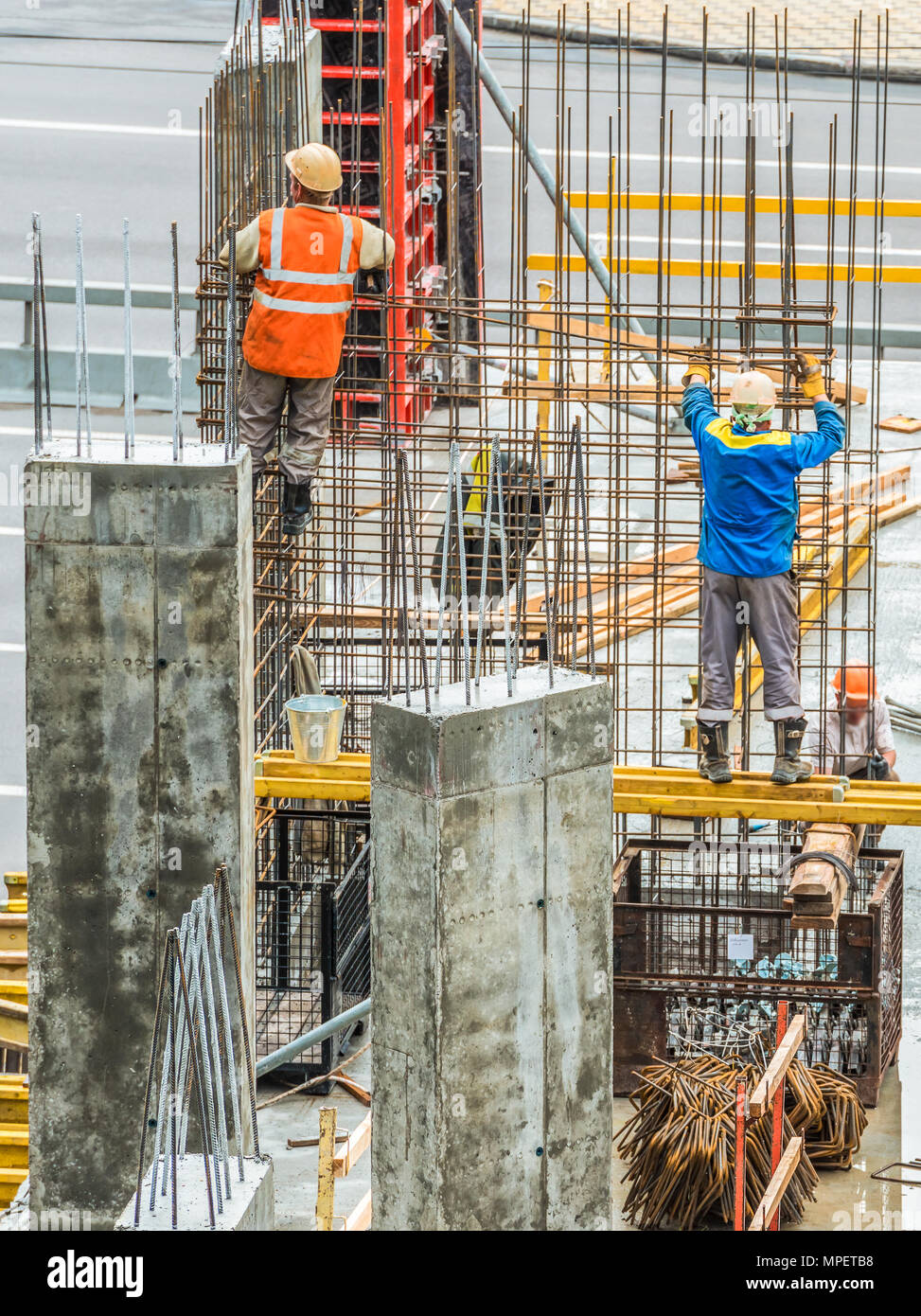 Workers are working on the construction site. Concrete construction ...