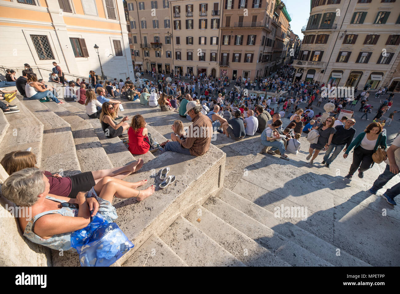 Rome Trinita de Monti, multitude of tourists sitting on Spanish steps ...