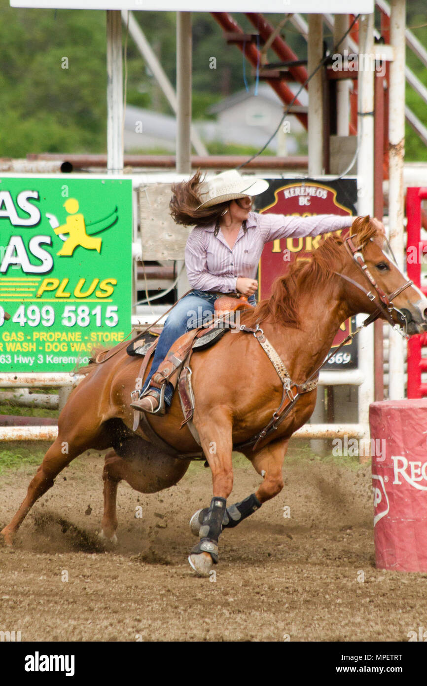 Ladies barrel racing Stock Photo - Alamy