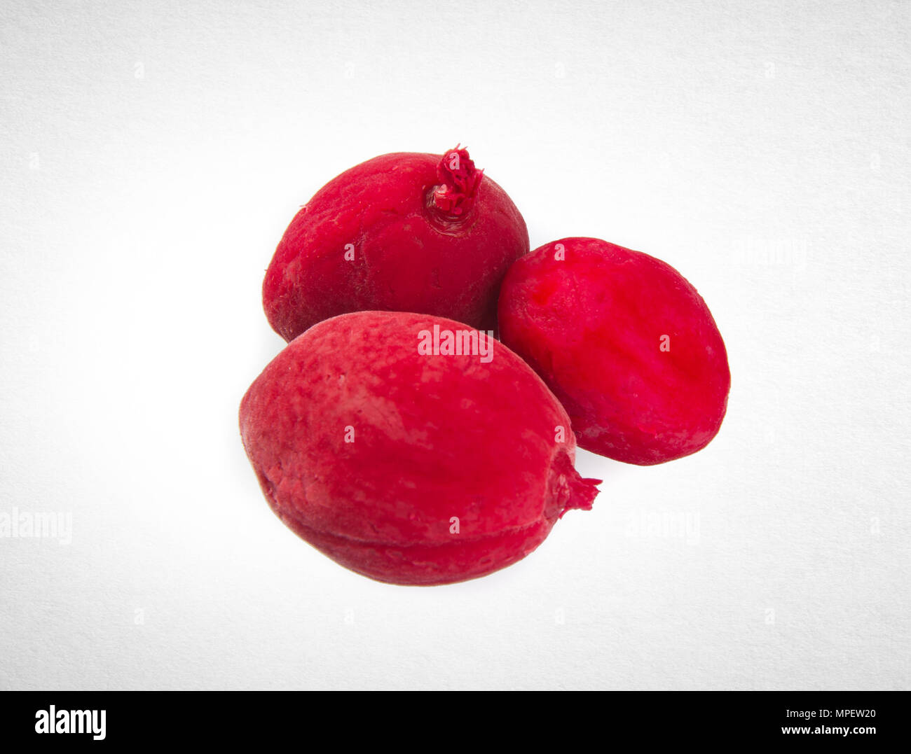 Dried preserved red peach on the background Stock Photo - Alamy