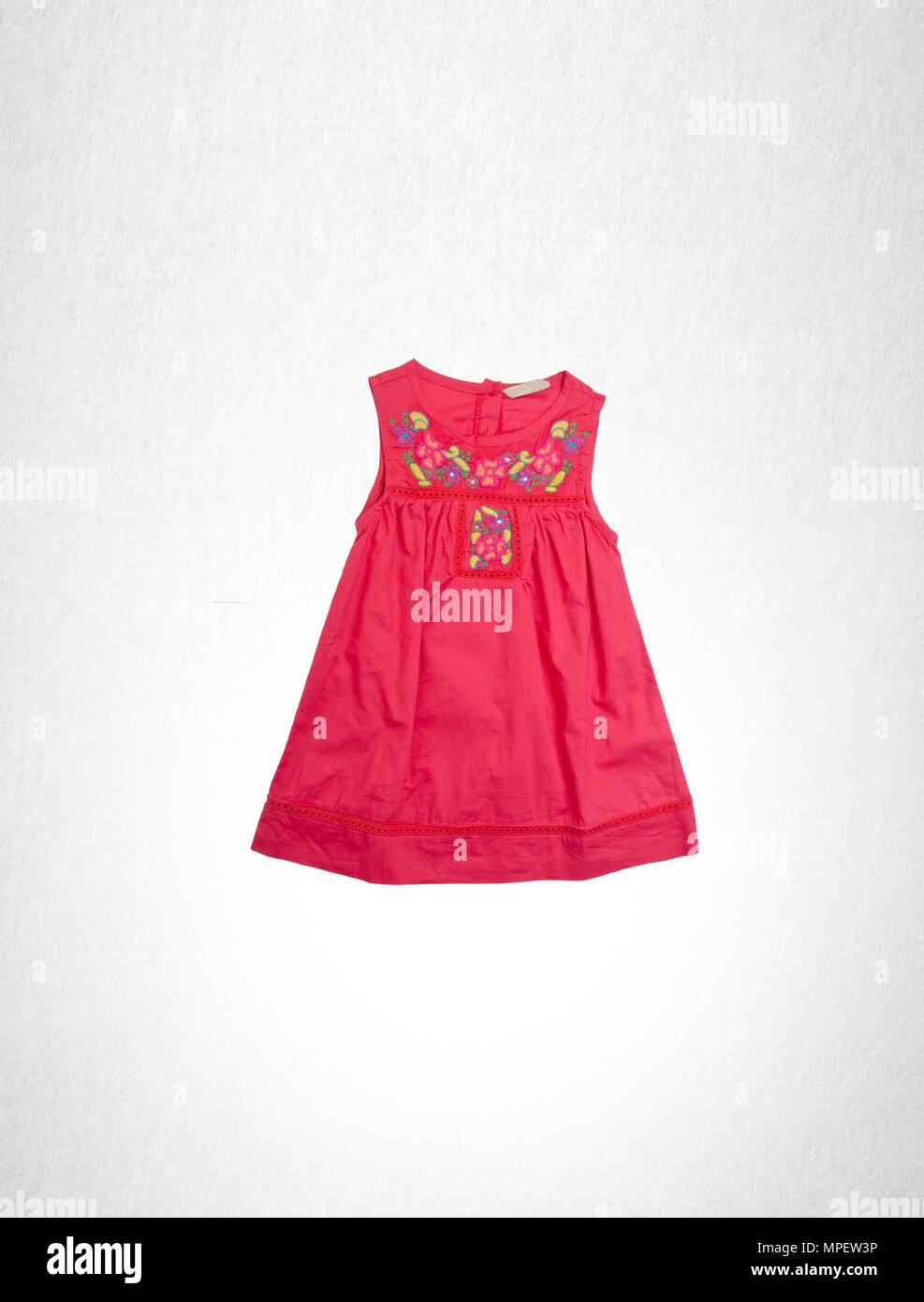 dress or dress for kids in red color on a background Stock Photo - Alamy