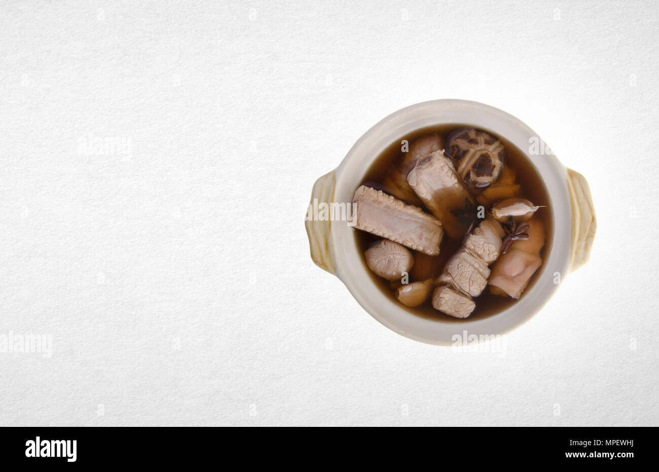 ba kut teh or malaysian stew of pork and herbal soup Stock Photo - Alamy