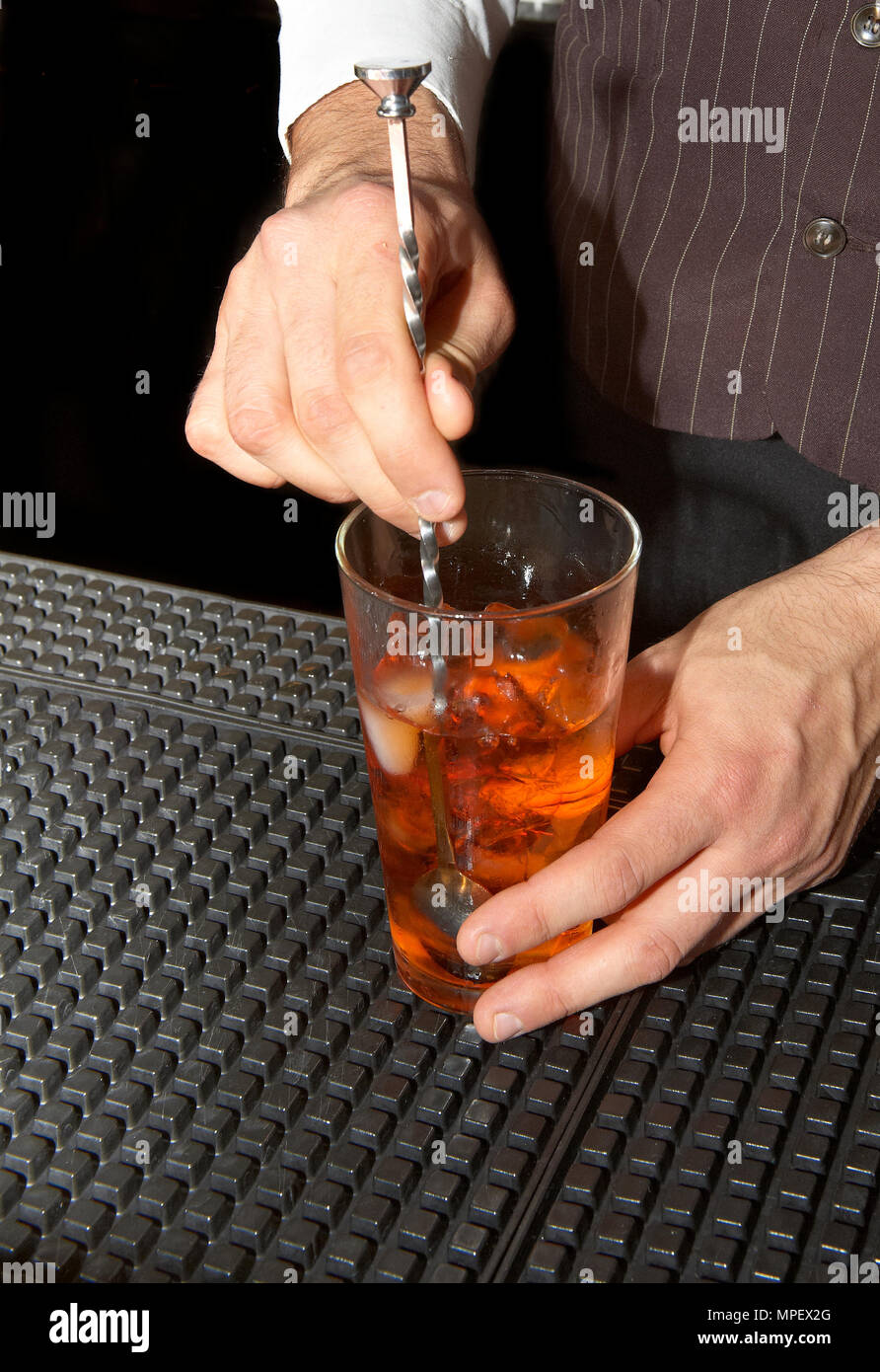 the preparation of a cocktail Stock Photo - Alamy