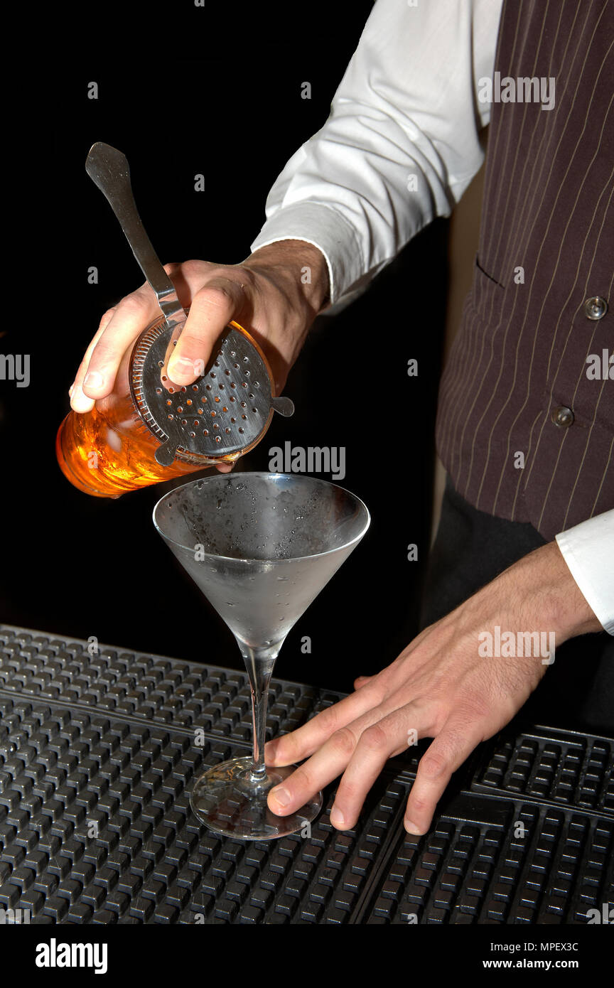 the preparation of a cocktail Stock Photo - Alamy