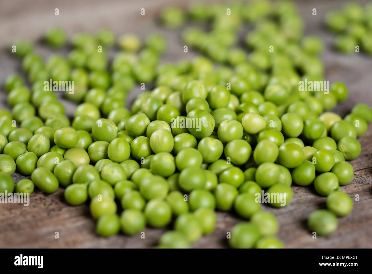 pea grains on the wood floor Stock Photo - Alamy