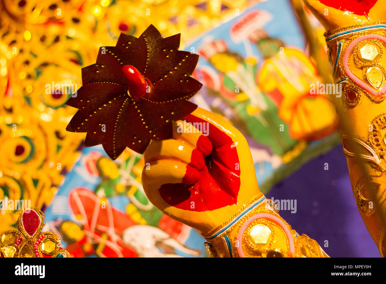 chakra on the finger of godess durga. hindu mythology idol worship ...