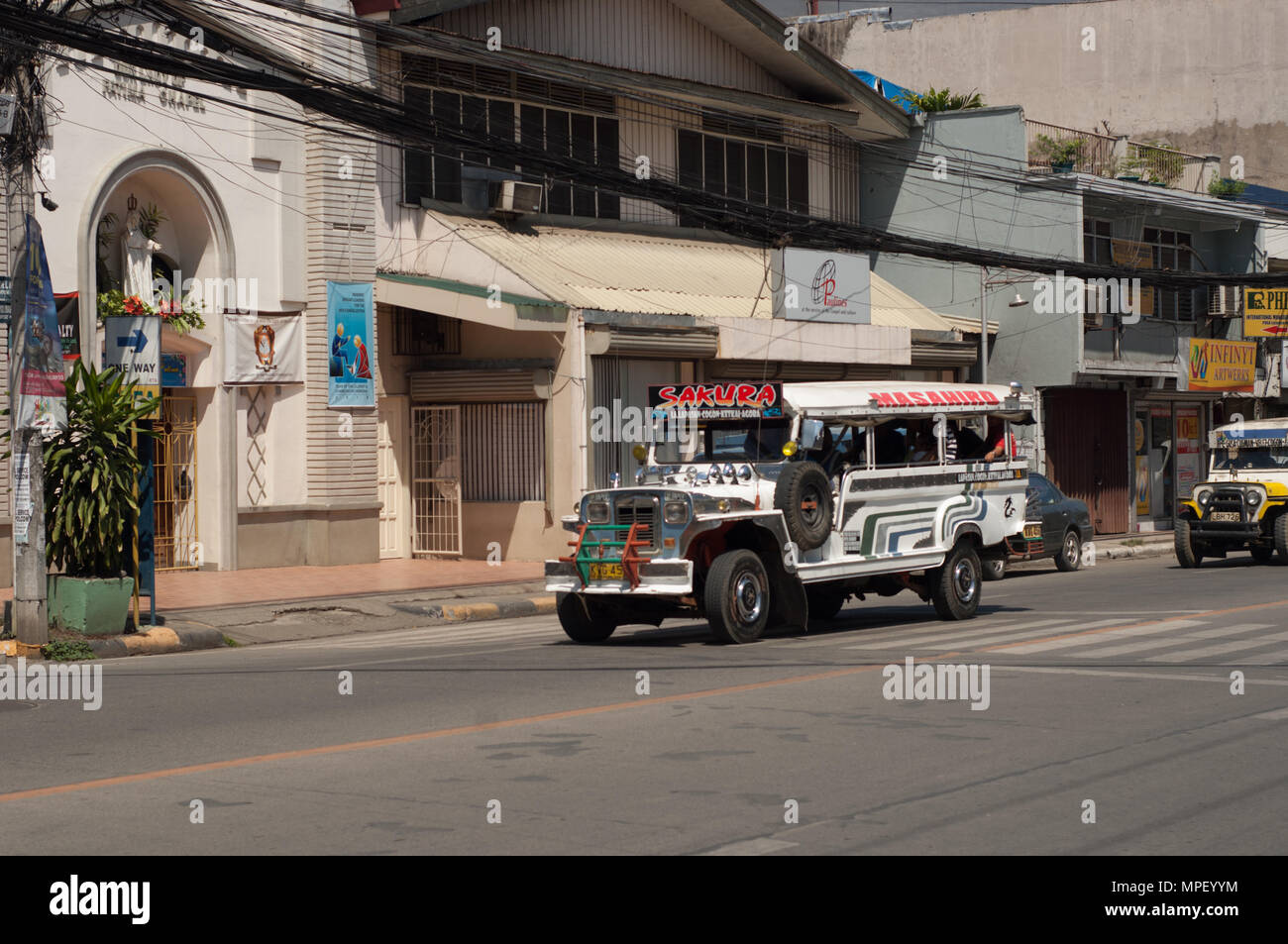Jeepneys, driving through Cagayan de Oro, Mindanao, Philippines Stock ...