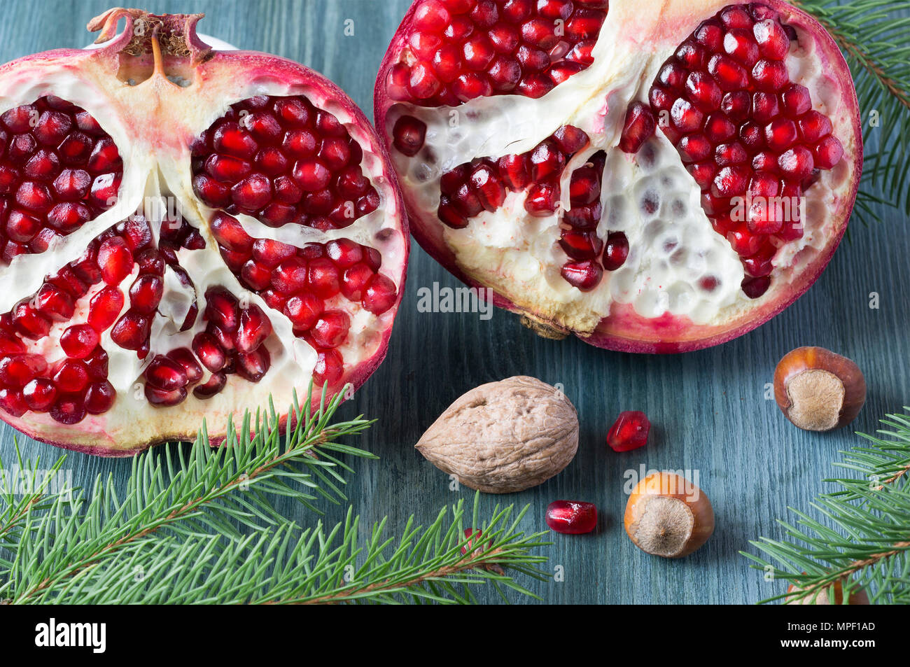 Fresh ripe garnet on wooden table. Top view. Christmas concept. Vintage ...