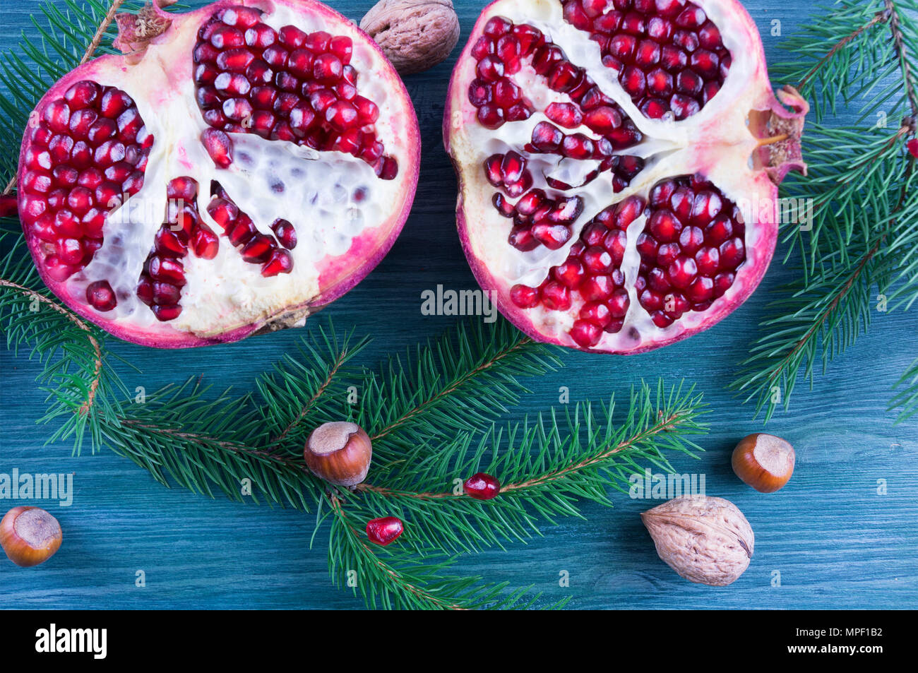 Fresh ripe garnet on wooden table. Top view. Christmas concept. Vintage ...