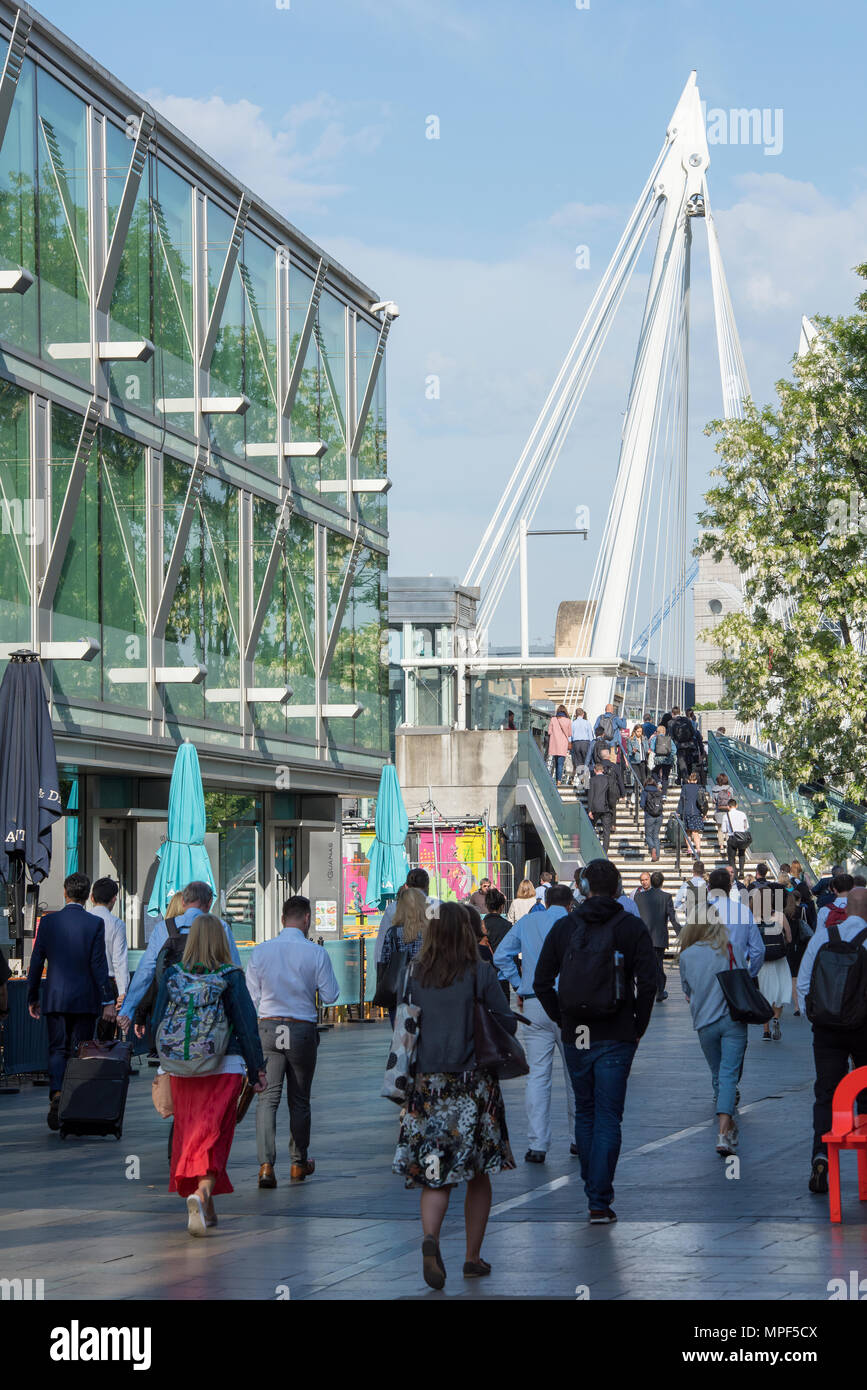 commuters walking to work next to the southbank centre and royal ...