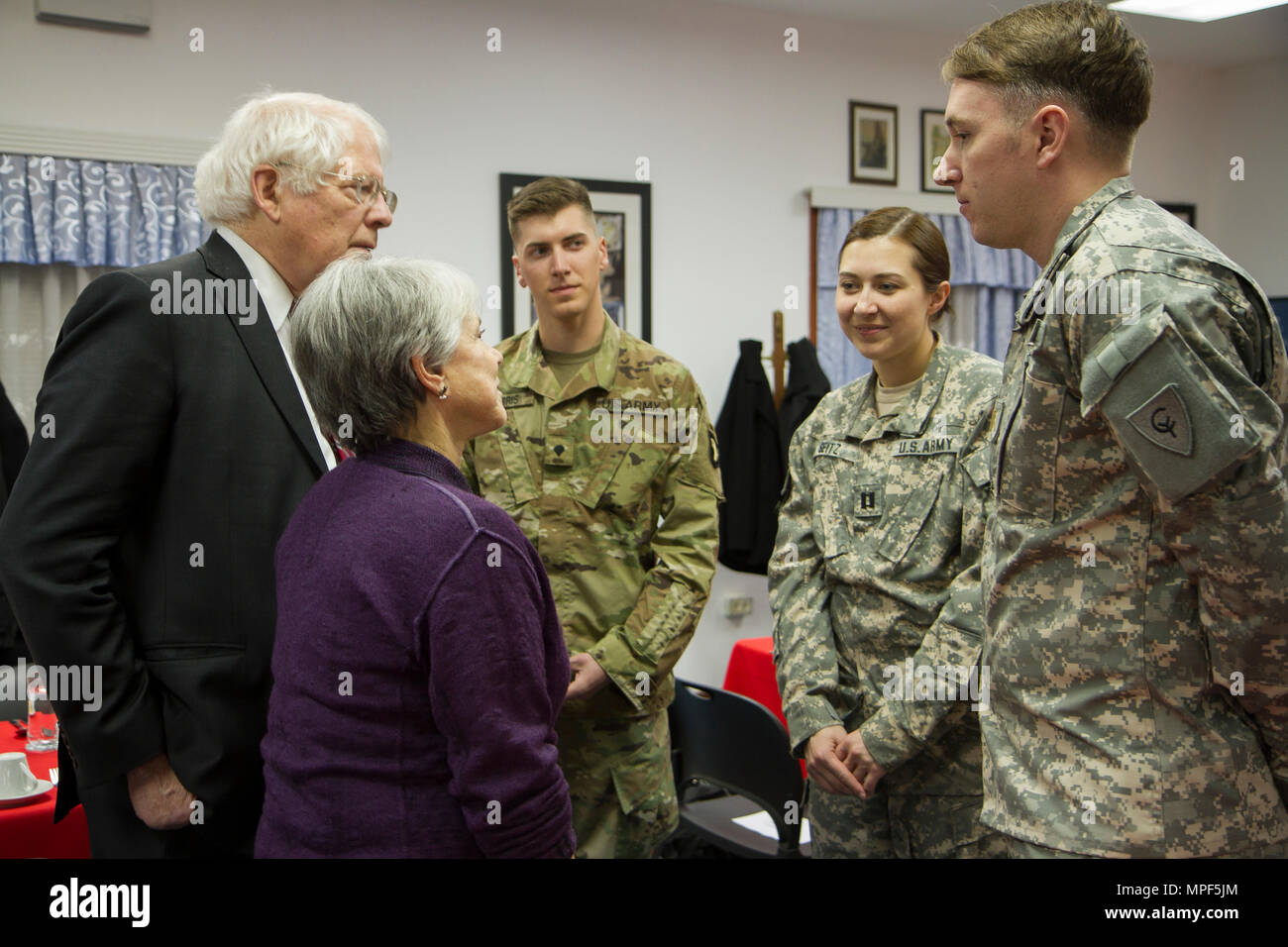 North Carolina U.S. Rep. David Price, and his wife Lisa, speak with ...