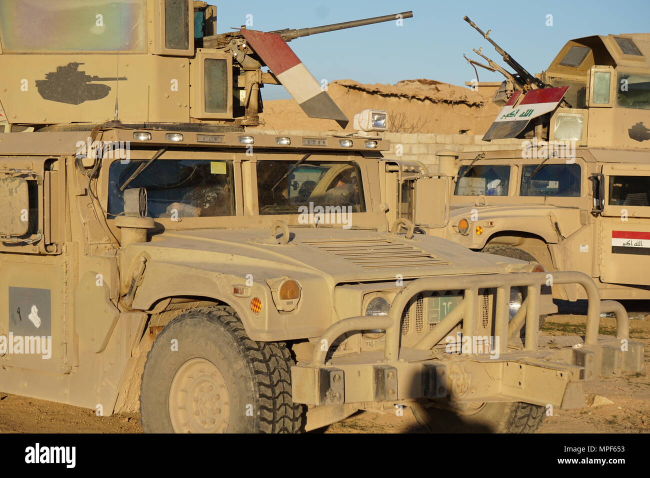 9th Iraqi Army Division humvees are staged after supporting the ...
