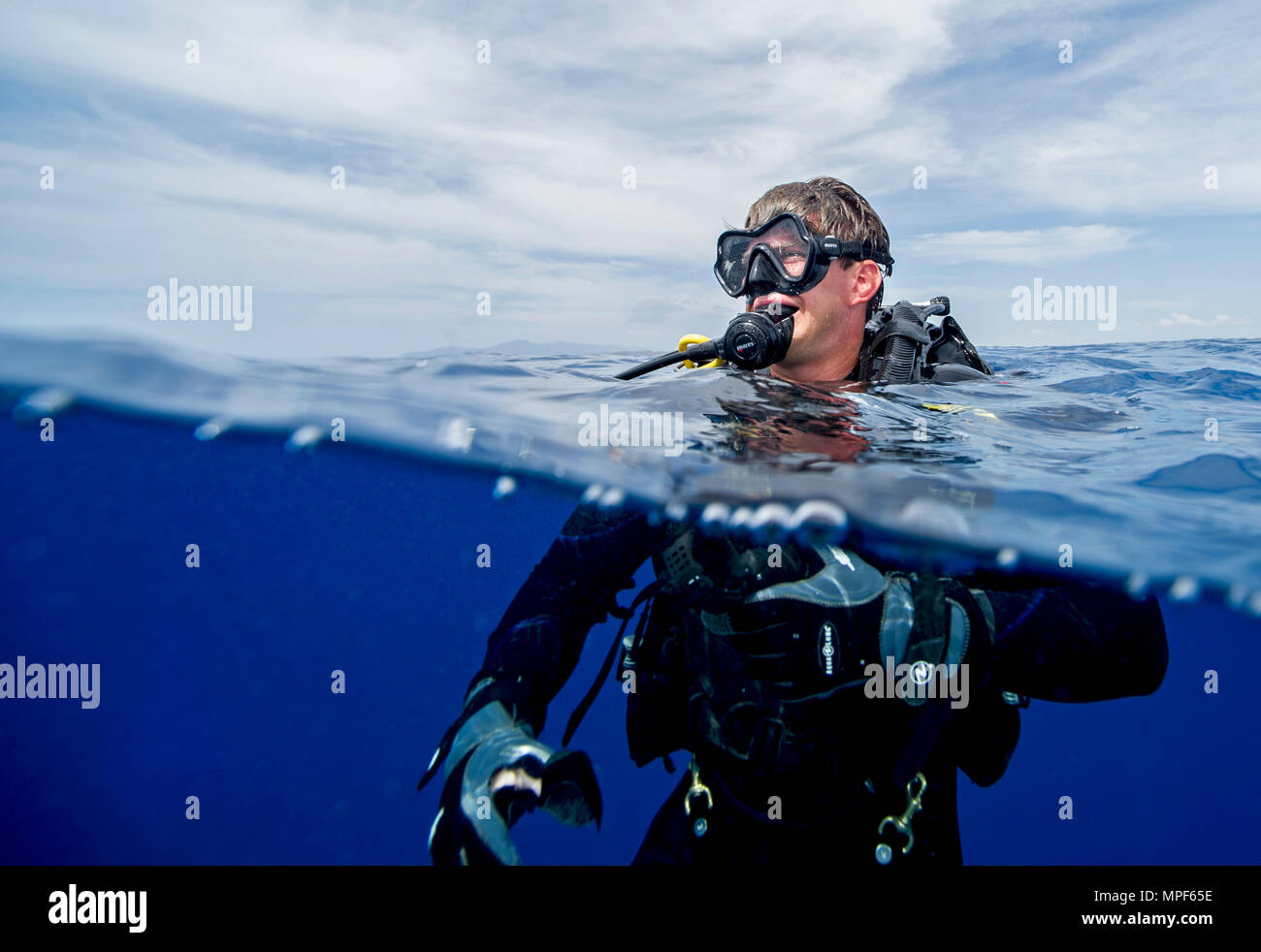 U.S. Navy Lt. j.g. Max Renaldo, assigned to Underwater Construction ...