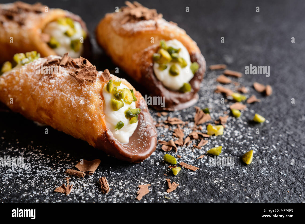 Cannoli Siciliani - traditional dessert stuffed with ricotta cream and ...