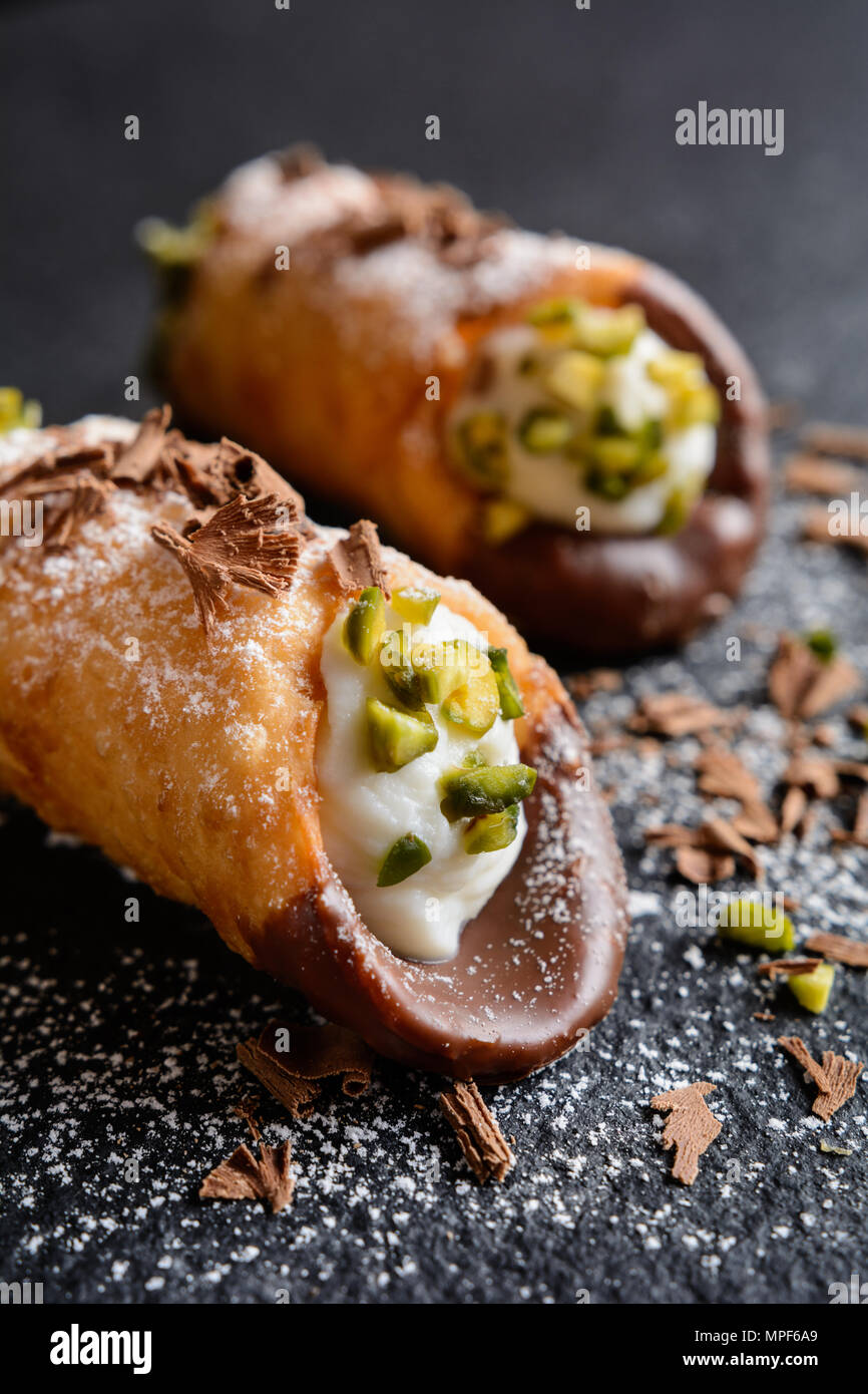 Cannoli Siciliani - traditional dessert stuffed with ricotta cream and ...