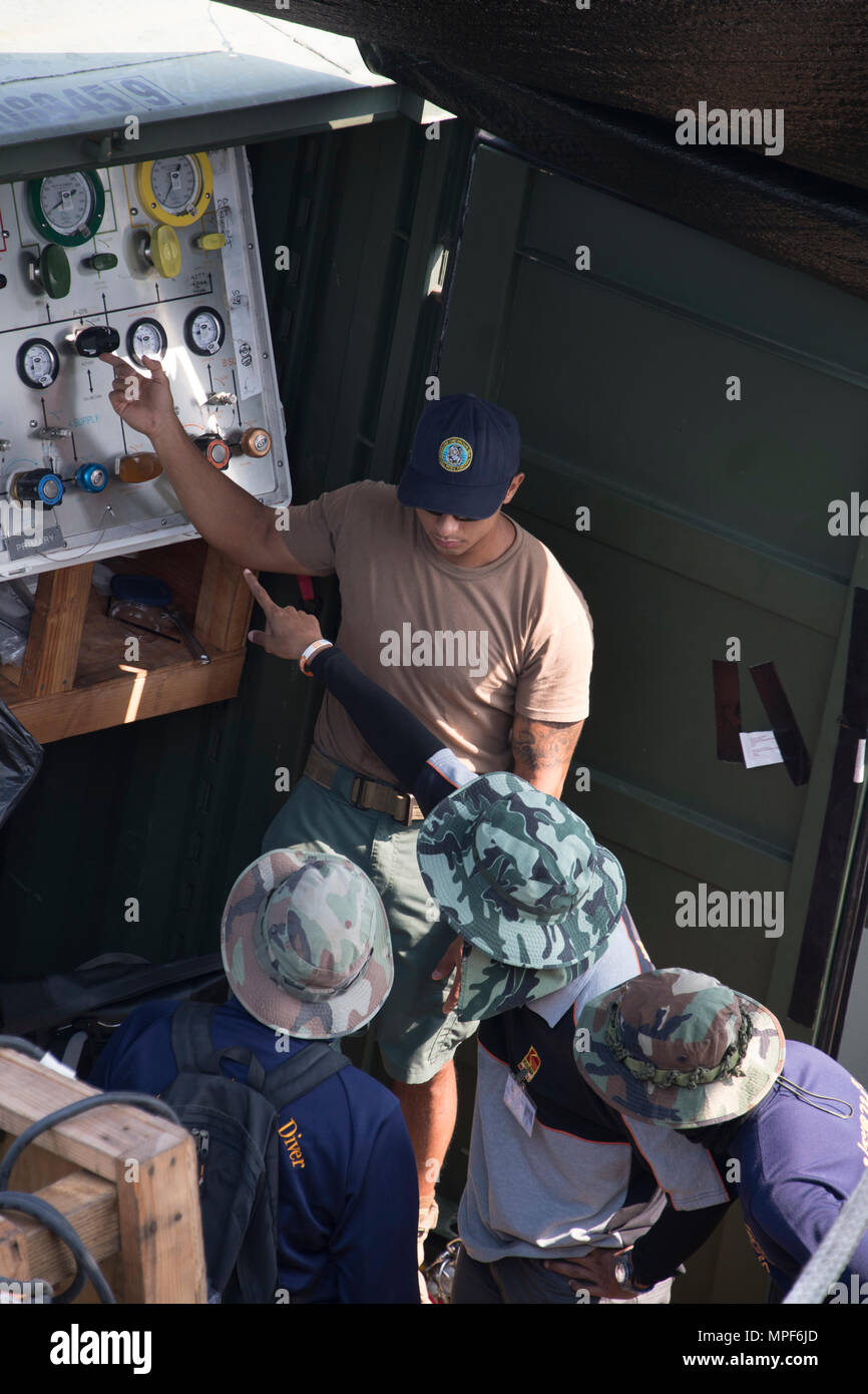 U.S. Navy Equipment Operator 3rd Class Thomas Dahlke, a Seabee with ...