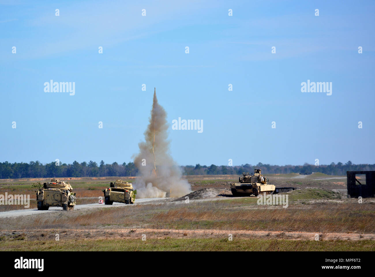A M1 Assault Breacher Vehicle from the 10th Engineer Battalion fires a ...
