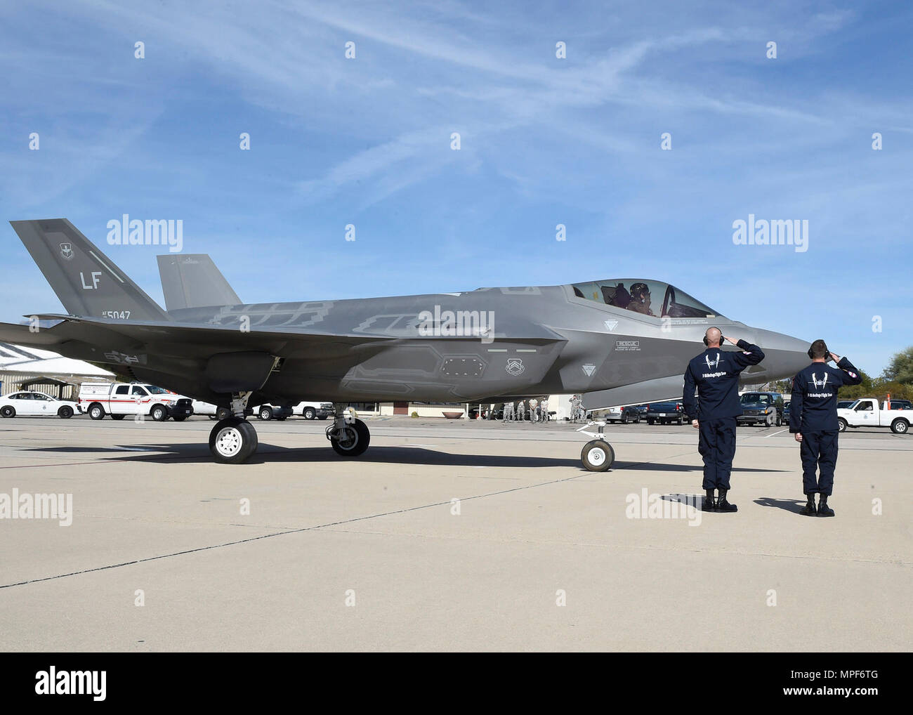 Maintainers with the F-35 Lightning II heritage team salute Maj. Will ...