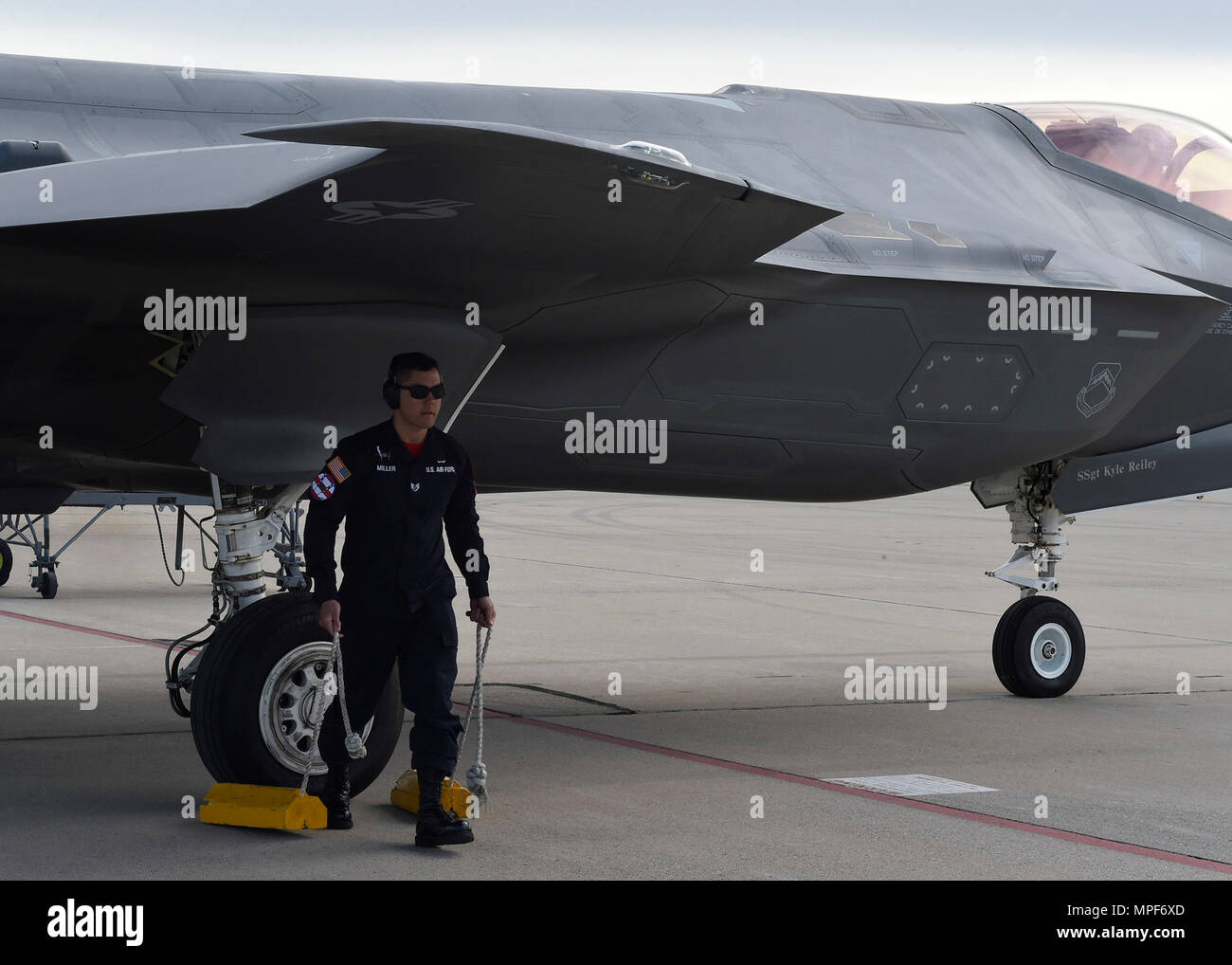 Staff Sgt. Jeremy Miller, 61st FS heritage flight team avionics, pulls ...