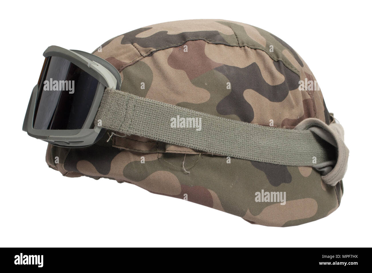 kevlar helmet with camouflage cover and protective goggles Stock Photo ...