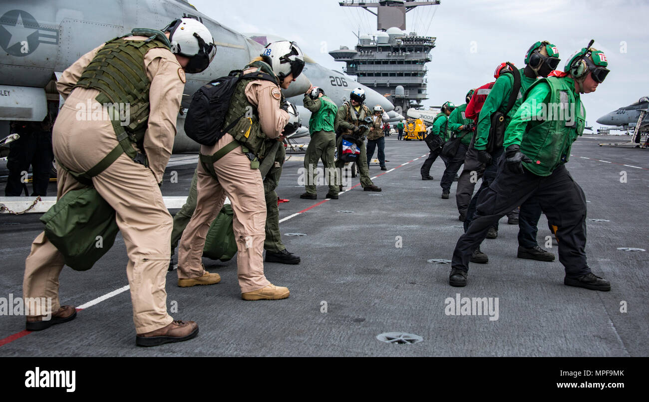 170218-N-BL637-023 LUZON STRAIT (Feb. 18, 2017) Sailors brace ...