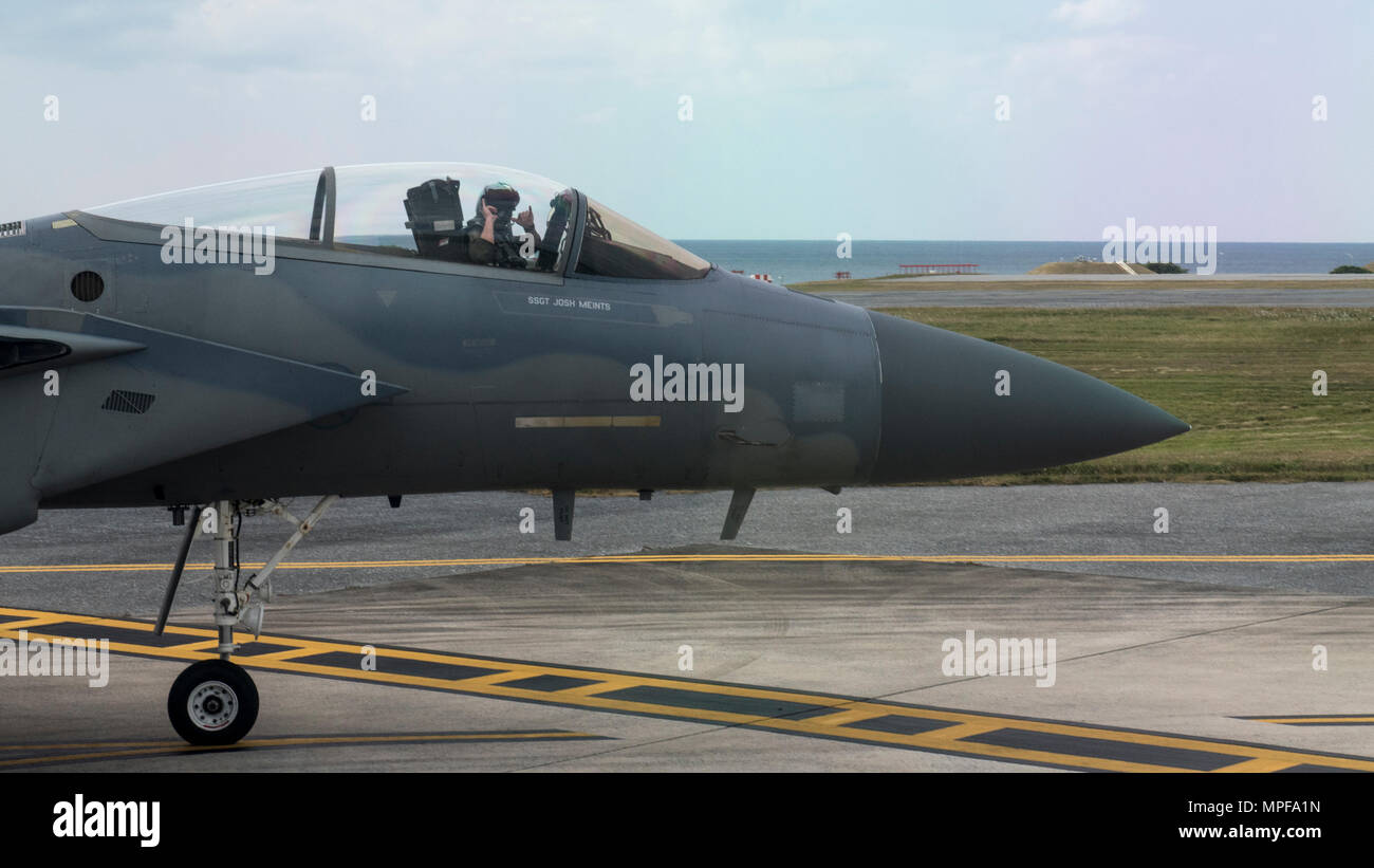 A U.S. Air Force 44th Fighter Squadron F-15 Eagle taxis toward the ...