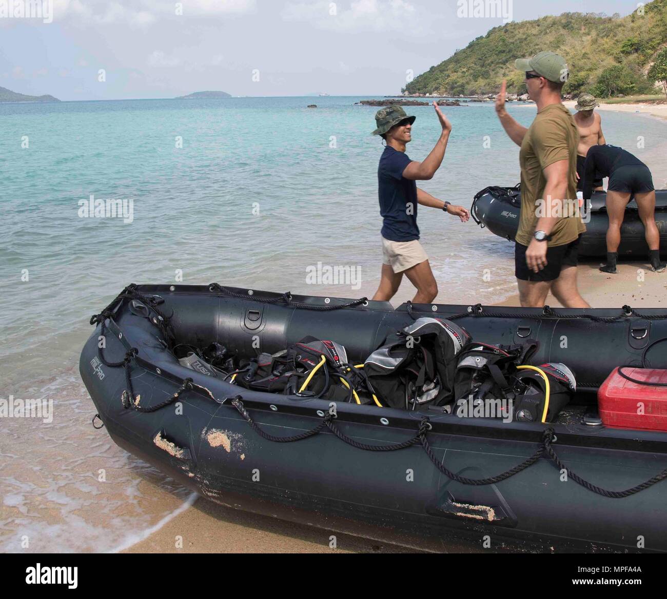 A Royal Thai Navy Explosive Ordnance Disposal (EOD) diver, with the ...