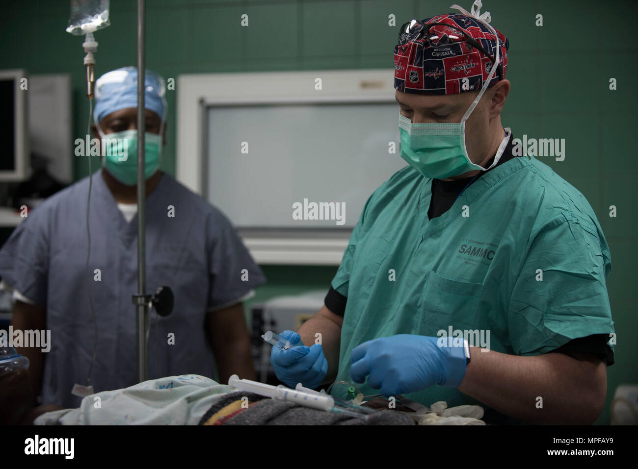U.S. Army Maj. Keith Lathrop, a nurse anesthetist, assigned to Brooke ...
